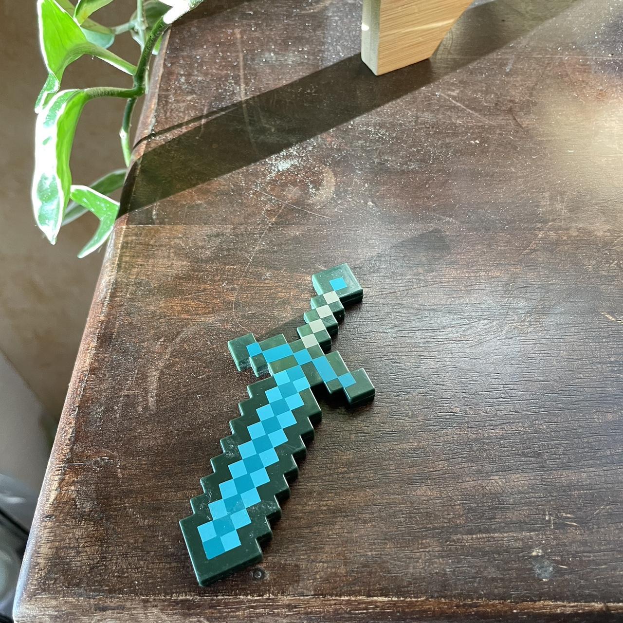 Minecraft blue diamond sword: Mini sword for your... - Depop