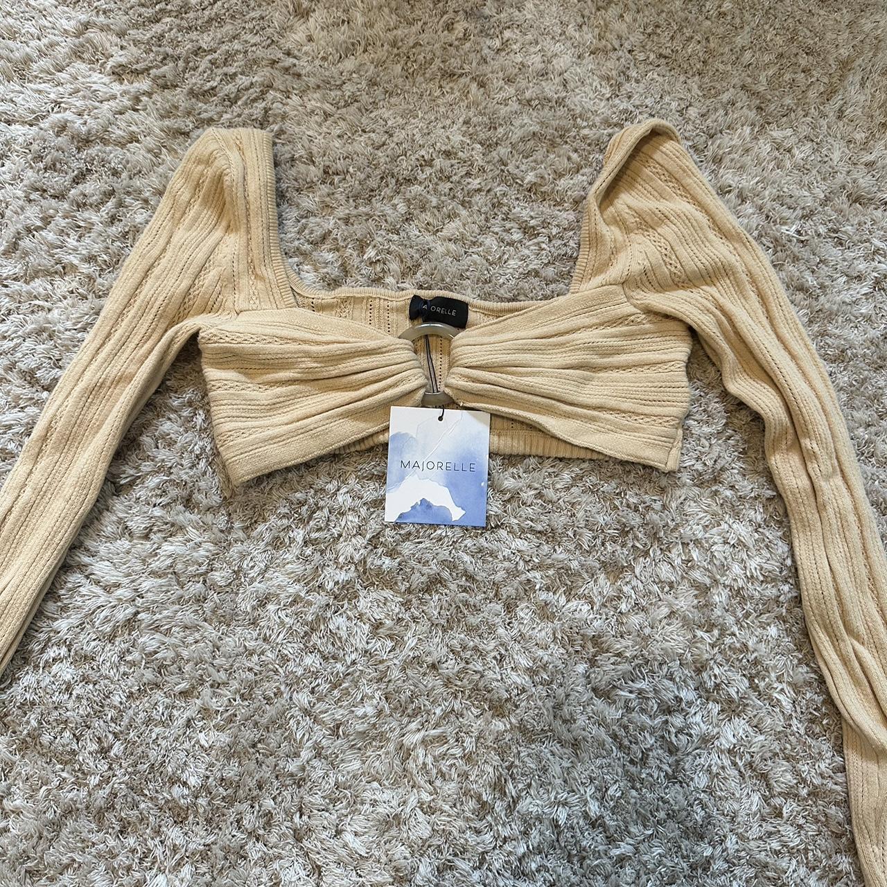 beige knit cropped top. beautiful on, but doesn’t... - Depop