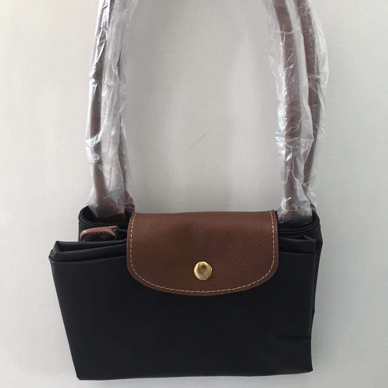 Need sold asap! Dark chocolate longchamp dupe... - Depop