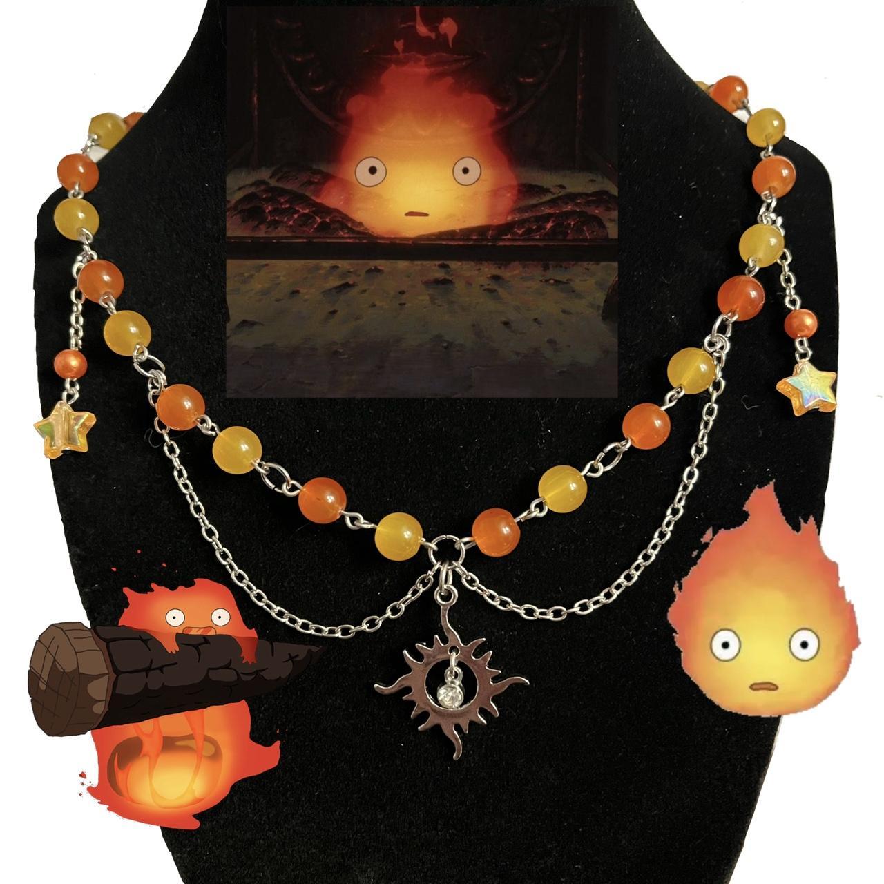 Howls moving castle Calcifer inspired necklace... - Depop