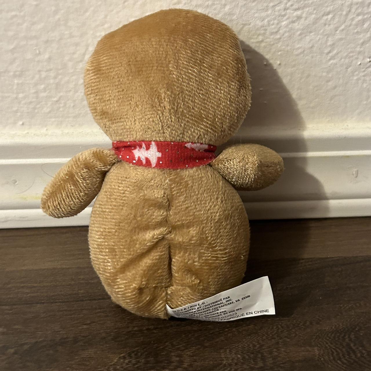gingerbread man stuffy with red and white accents... - Depop
