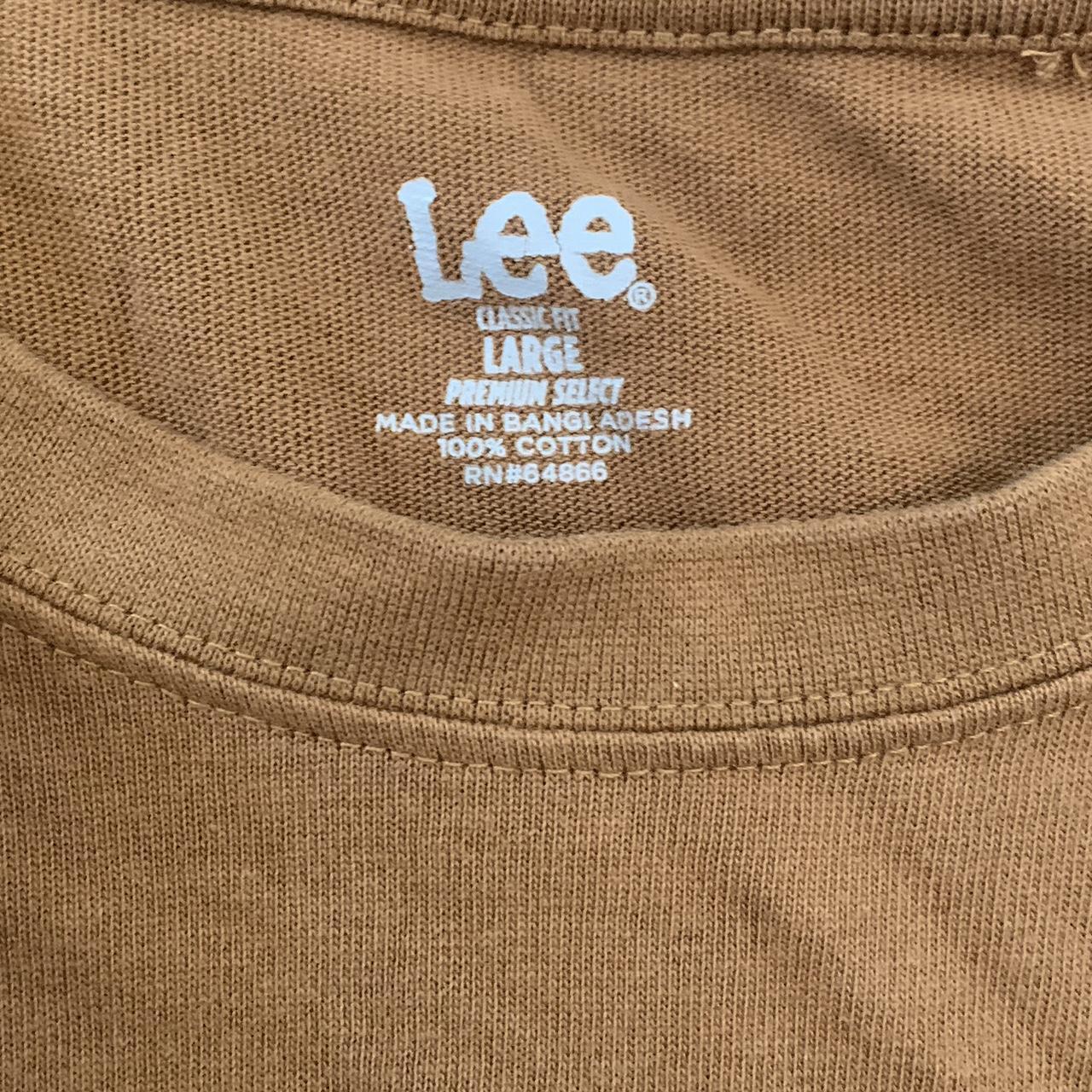 - Lee dungaree burnt orange colored long sleeve -... - Depop