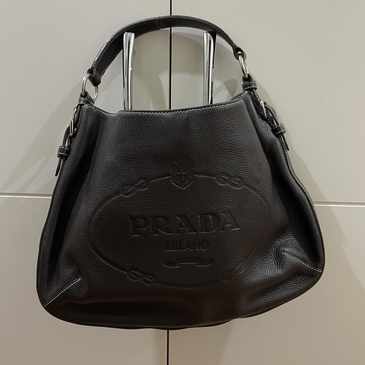 Authentic Prada embossed logo black shoulder... - Depop
