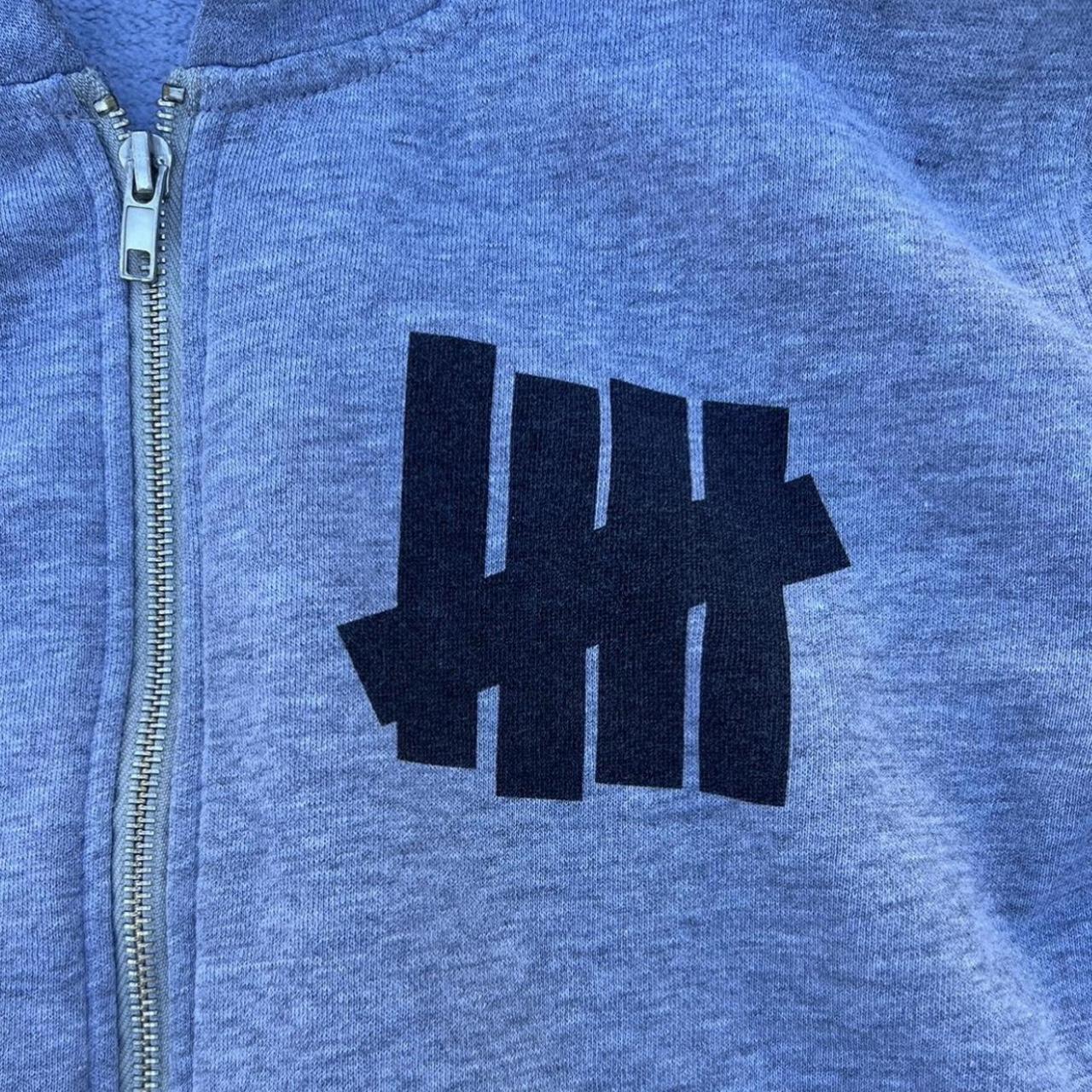 Undefeated Zip-up M - Depop