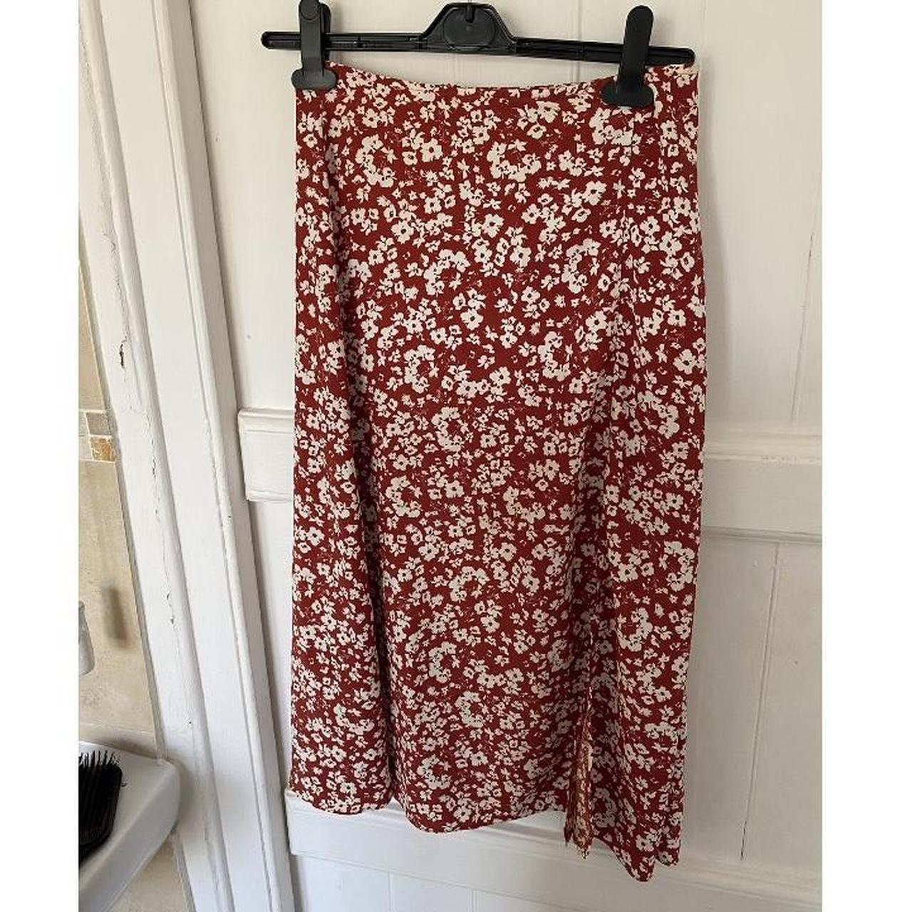 red and white floral print midi skirt with a slit on... - Depop