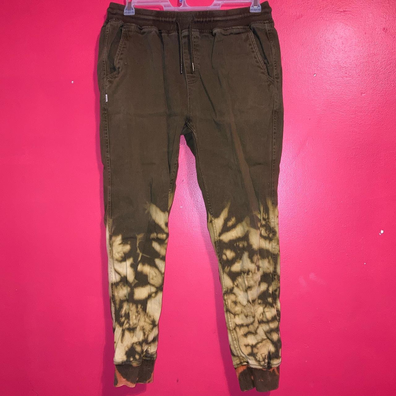 Khaki green joggers with bleach wash on bottom of... - Depop