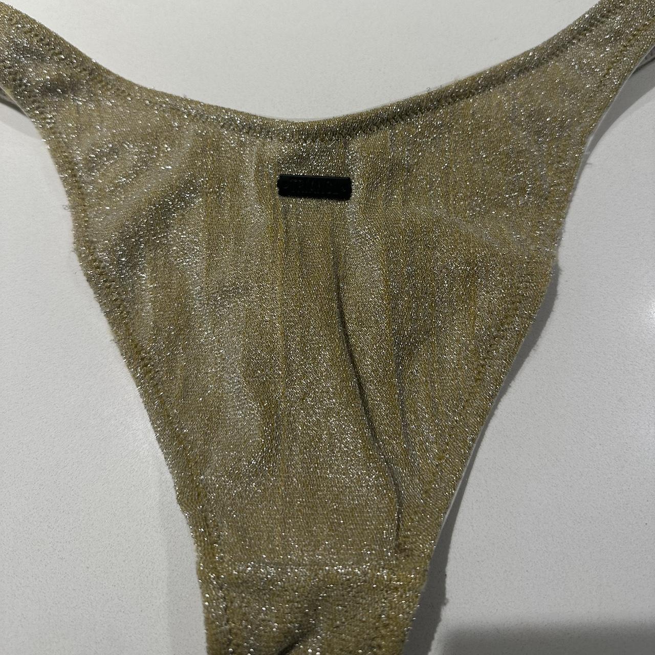 Triangl bikini A little bit of pilling on the back... - Depop