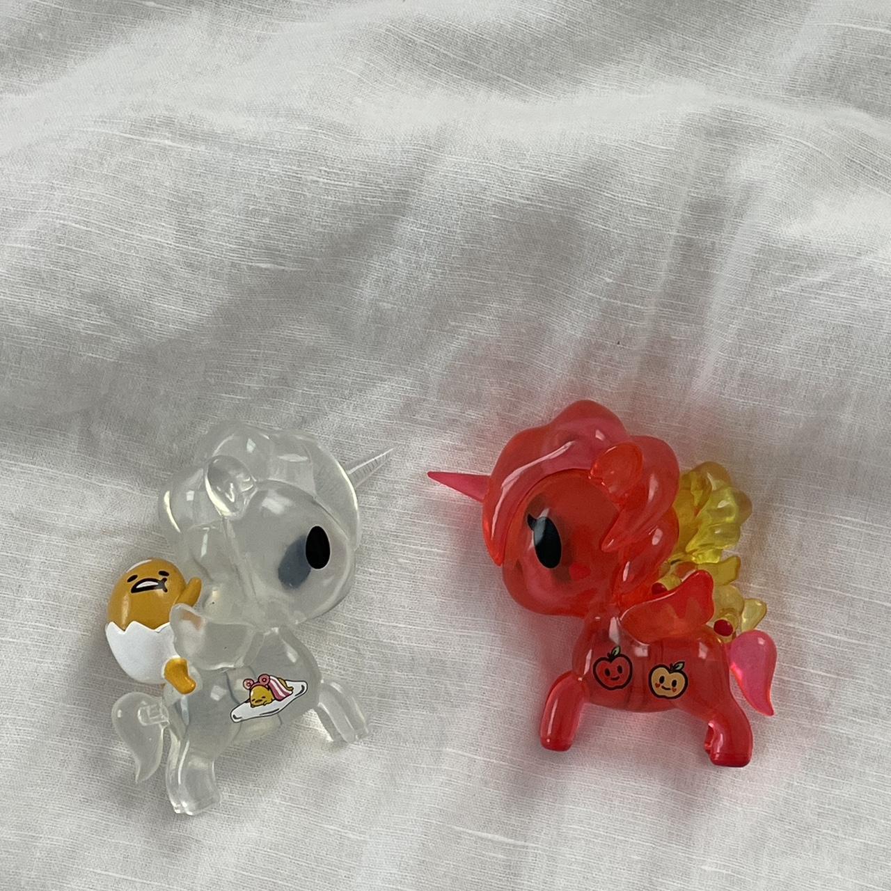 two tokidoki figurines ᪥ clear one is a sanrio... - Depop