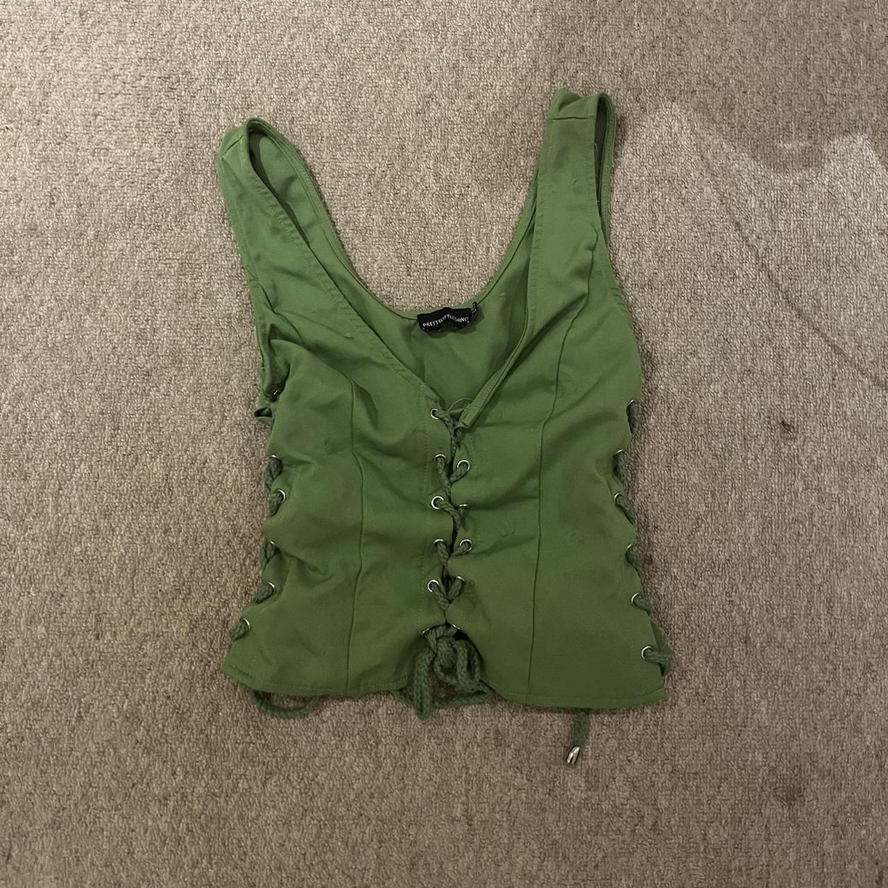 Green plt lace up top, size is a uk 6, been used so... - Depop