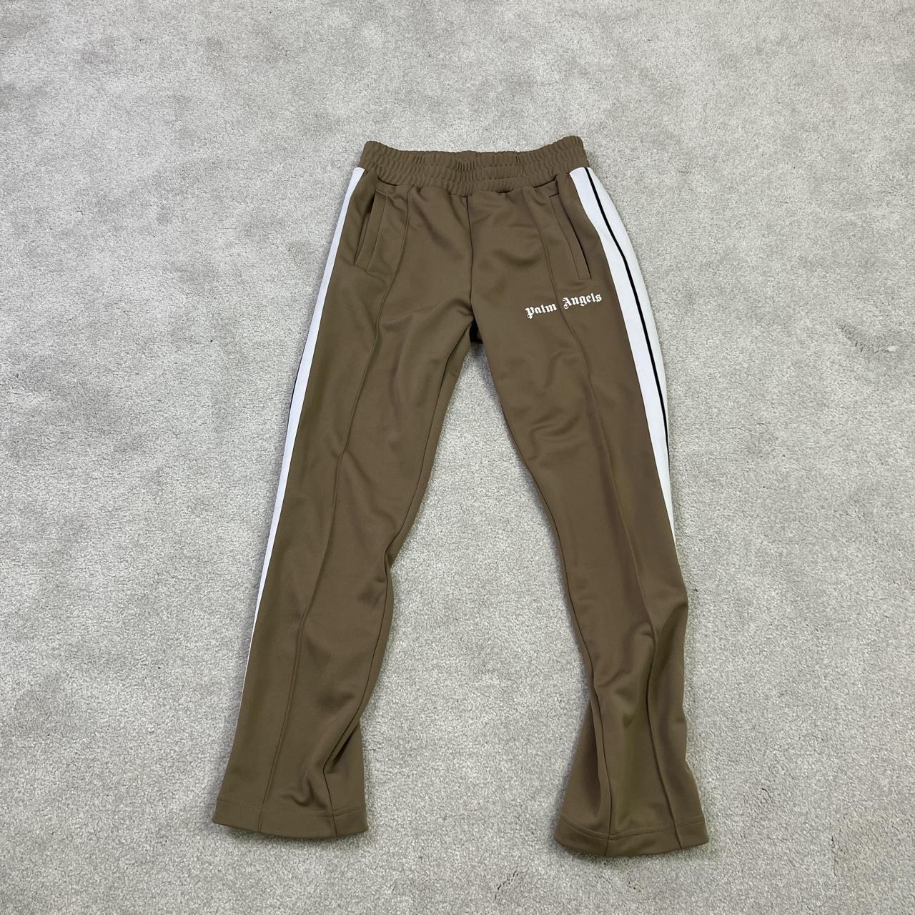 Palm angels track pants. Tan colour way. Size... - Depop