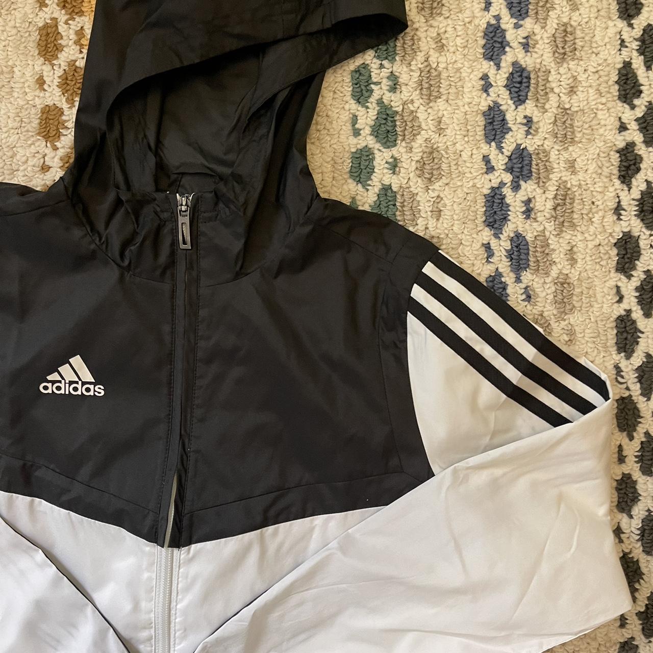 black and white adidas jacket fits like an xs but is... - Depop