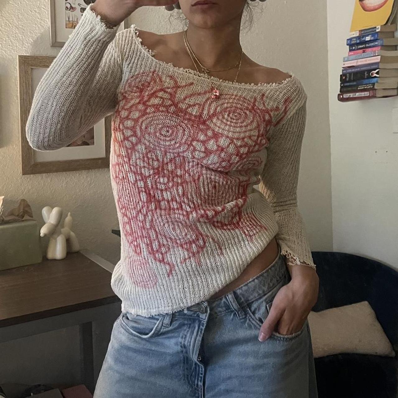 Distressed sweater with flower design - Depop
