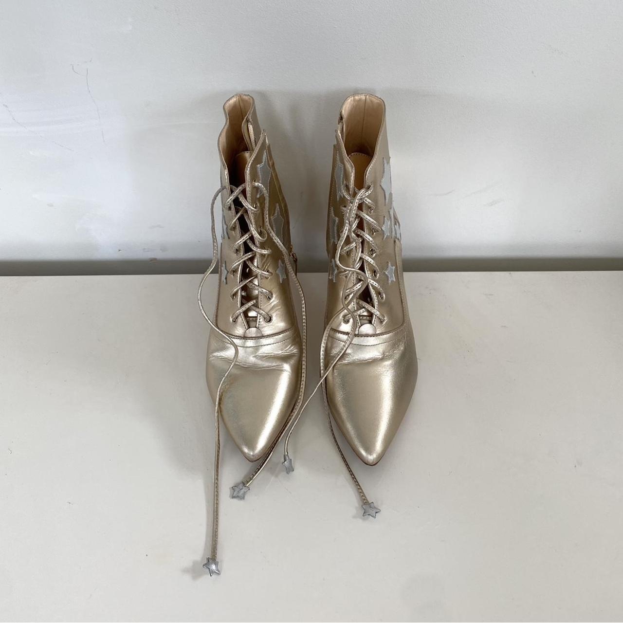 Gold star heeled boots! the coolest pair of boots... - Depop