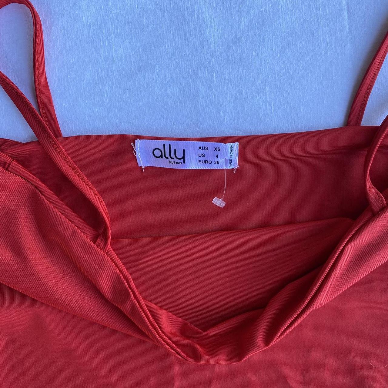Ally red tank top (really stretchy) Fits 6-8 tag... - Depop