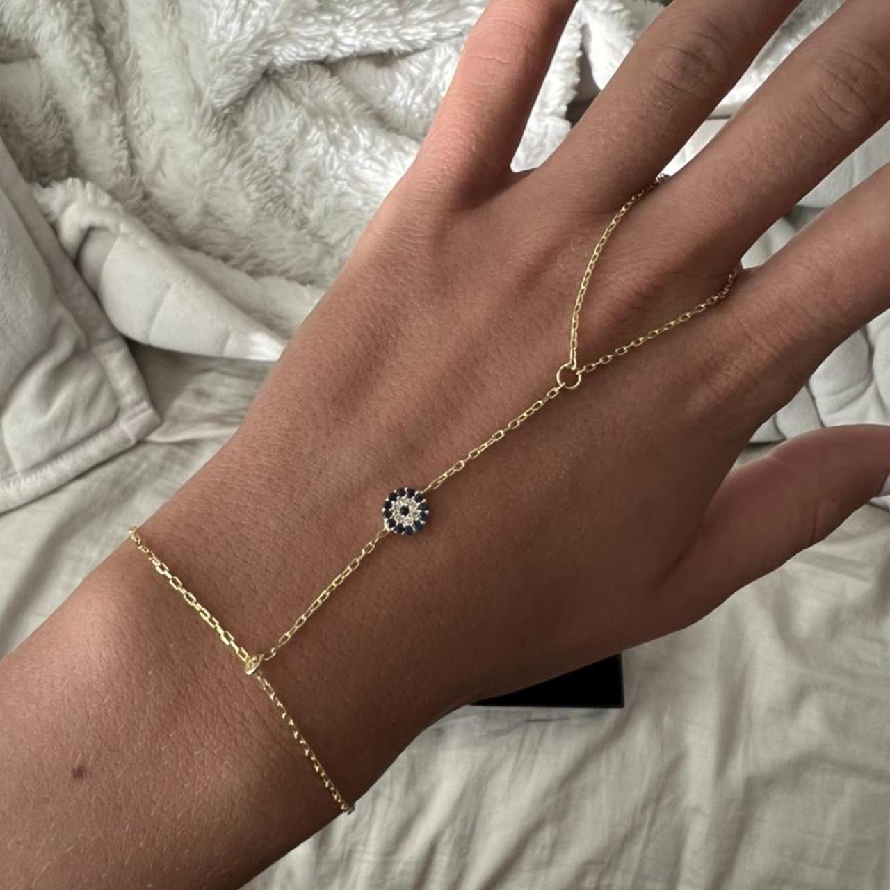 Brand new in box evil eye hand chain Never worn... - Depop