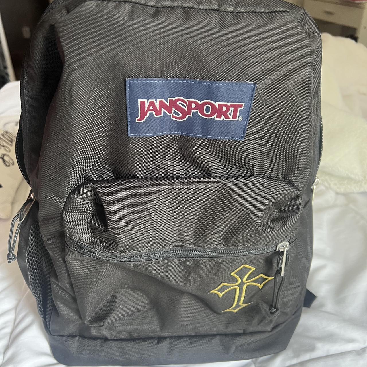 jansport black backpack with cross patch detail... - Depop