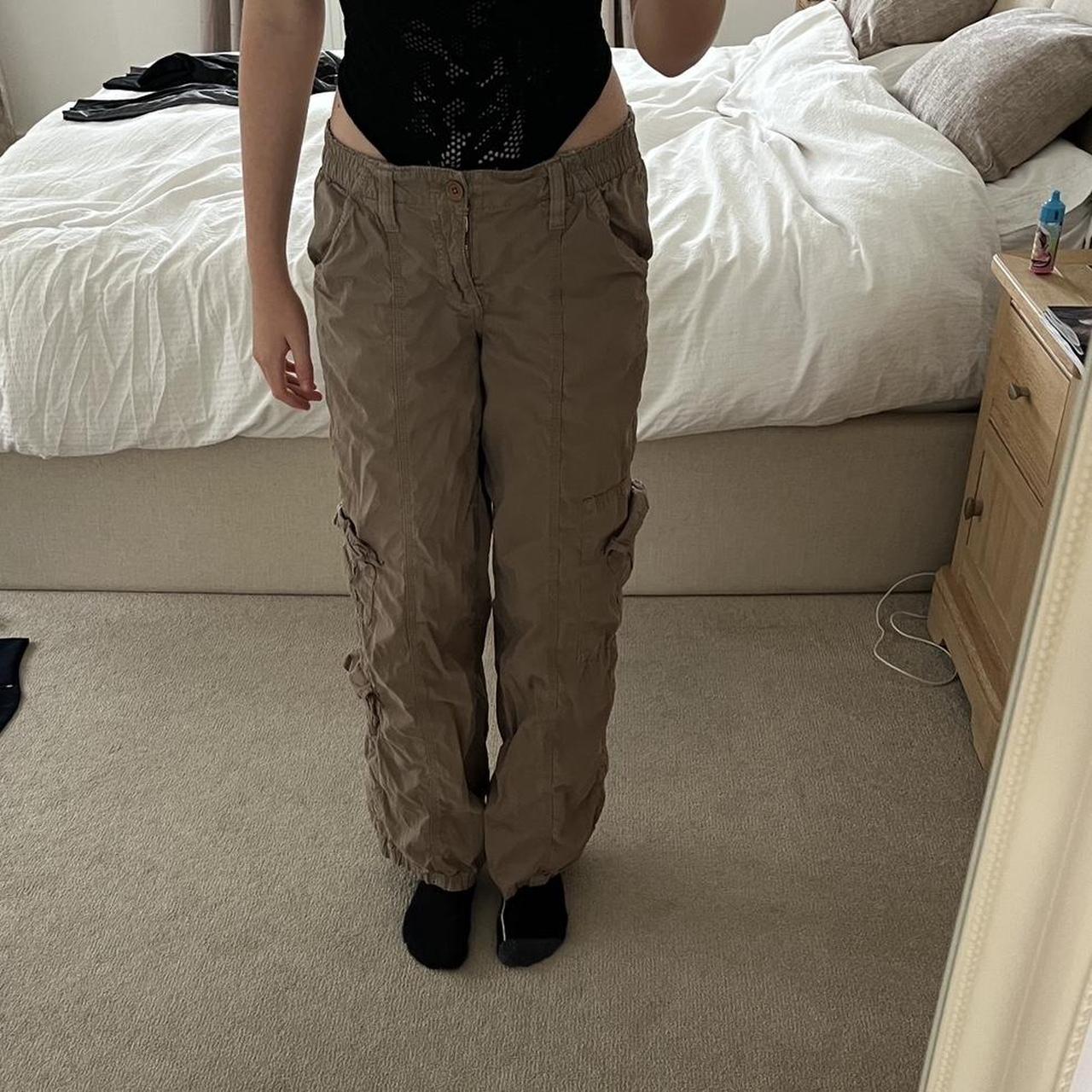 medium urban khaki cargos small hole in back pocket... - Depop