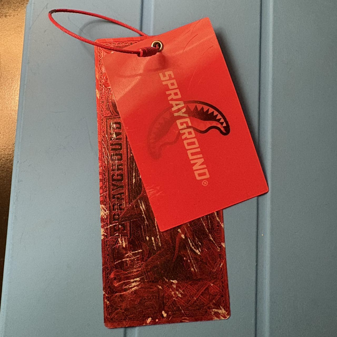 Red and black sprayground tag | Depop