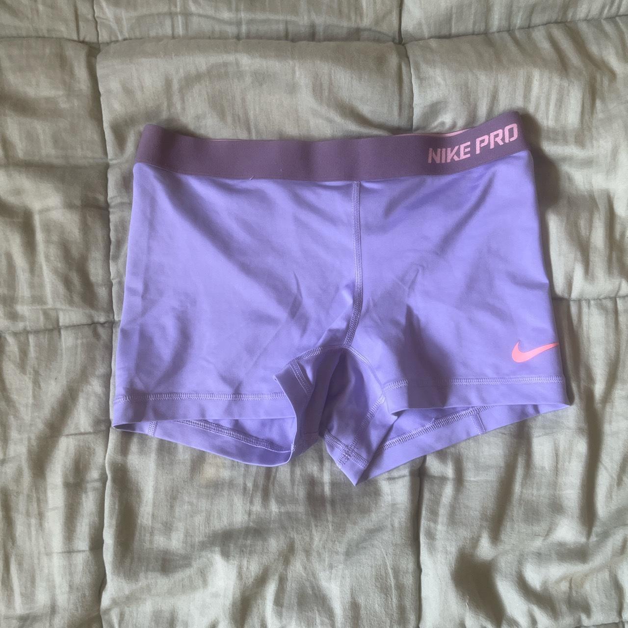 pink and purple nike pros size m but can definitely... - Depop