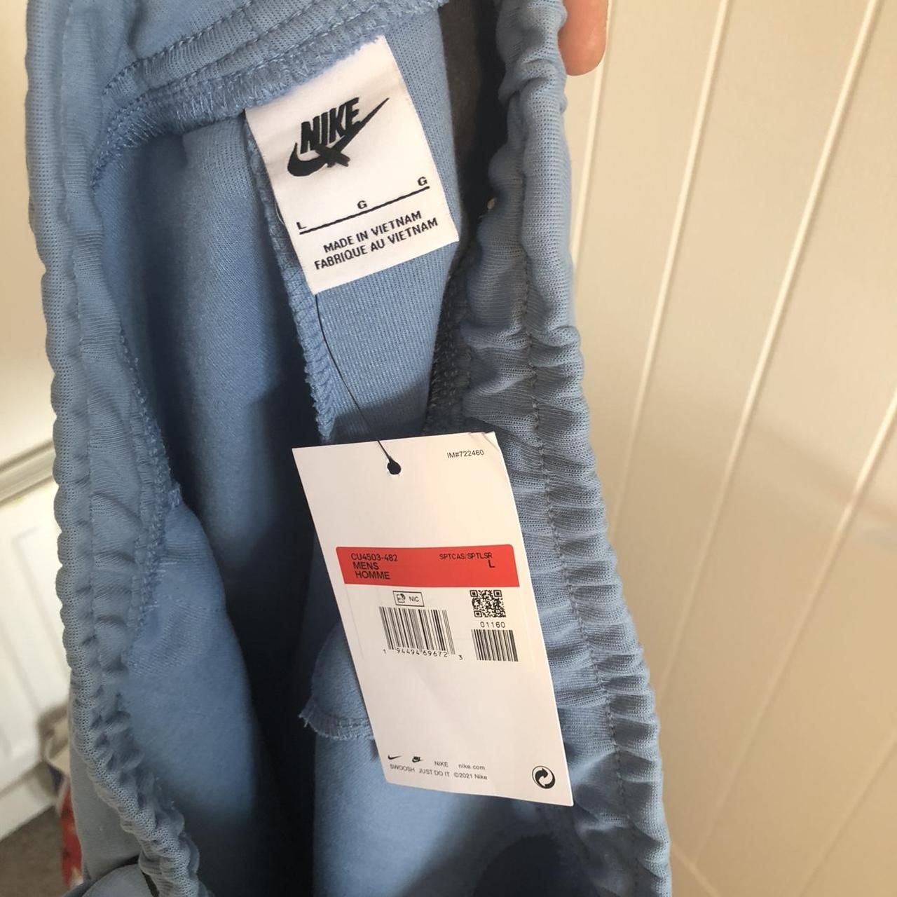 Baby blue Nike tech fleece shorts Size L Deadstock... - Depop