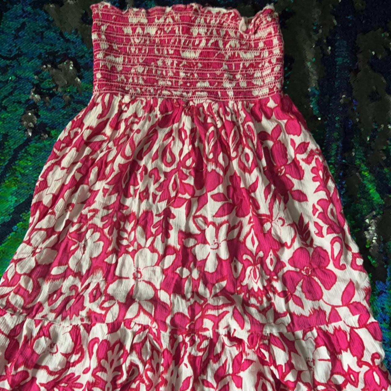This is a mid length pink flowery skirt. It is a... - Depop