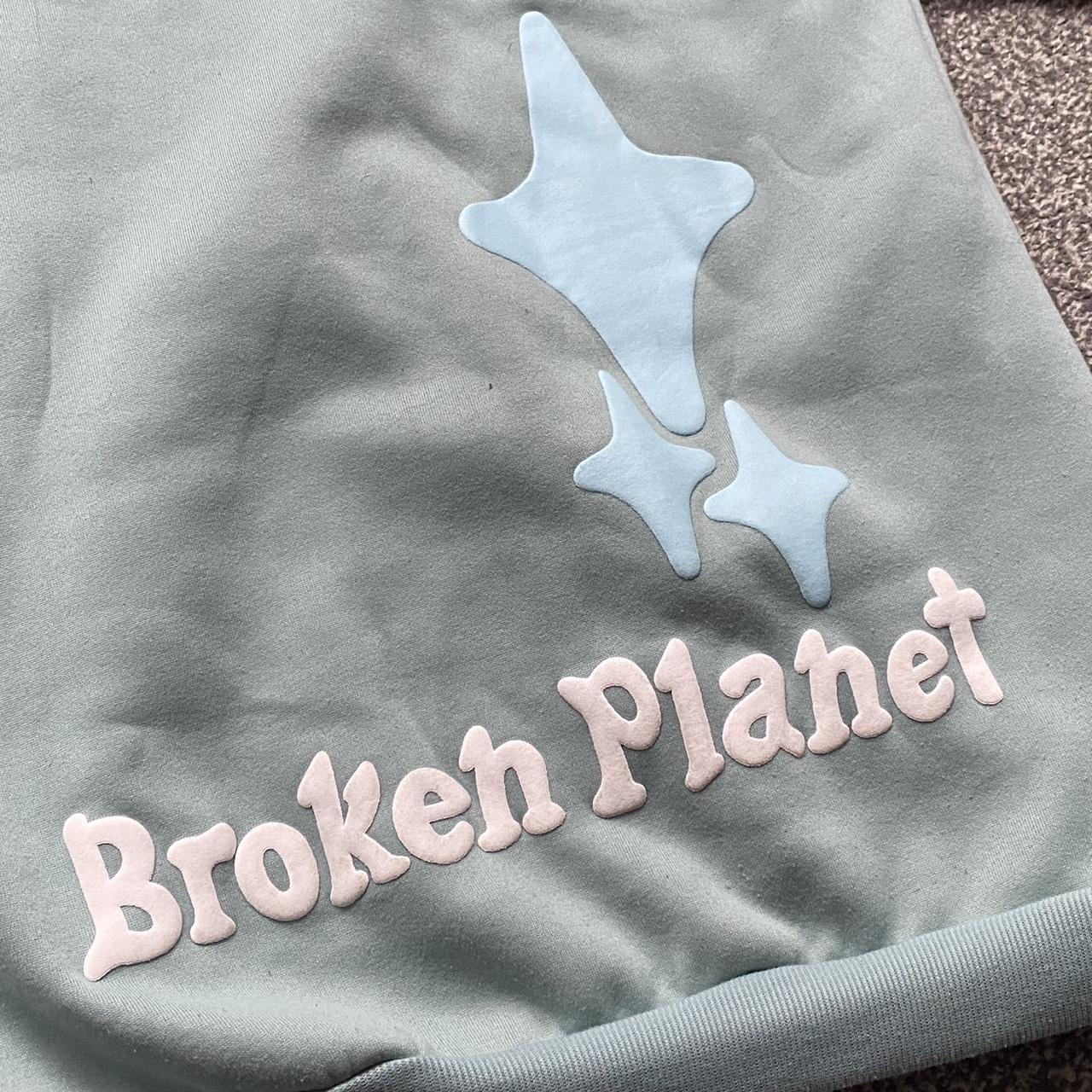 oversized broken planet cosmic connection hoodie dupe - Depop
