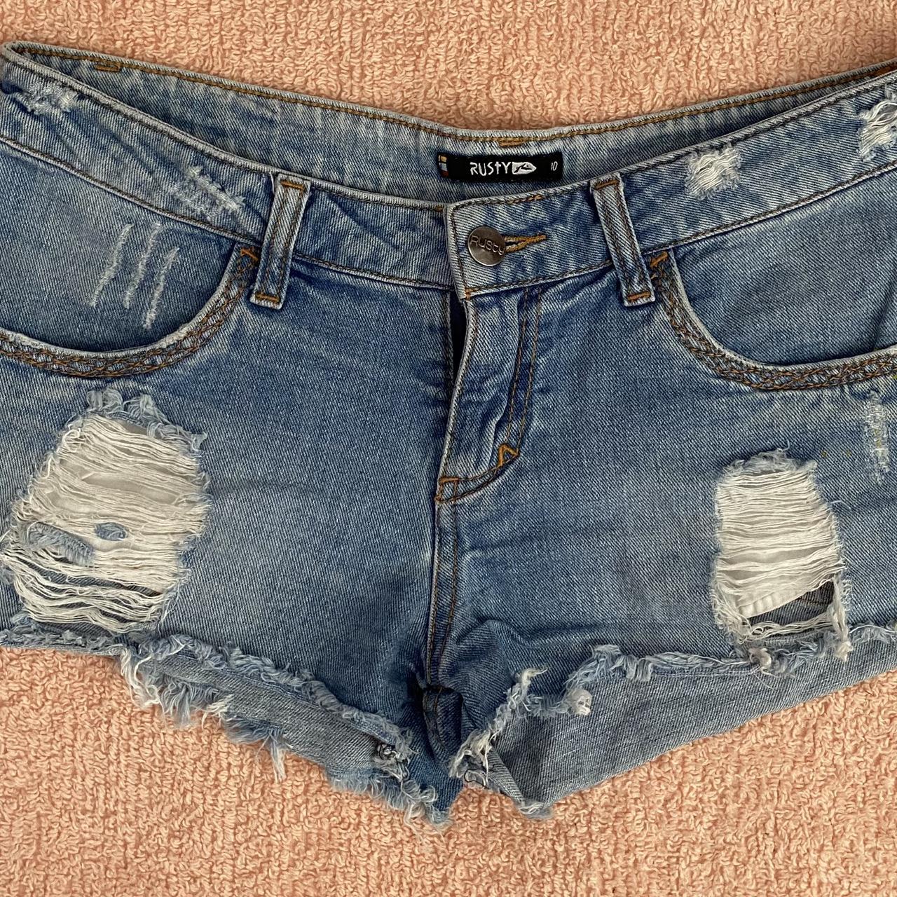 Cute denim shorts from Rusty. Has embroidered back... - Depop