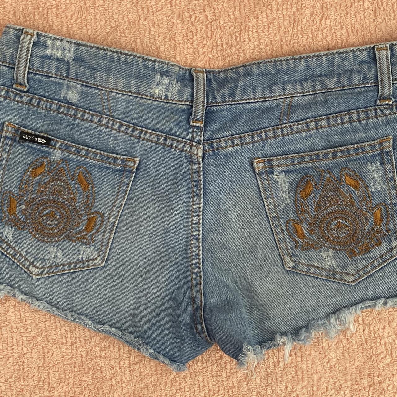 Cute denim shorts from Rusty. Has embroidered back... - Depop