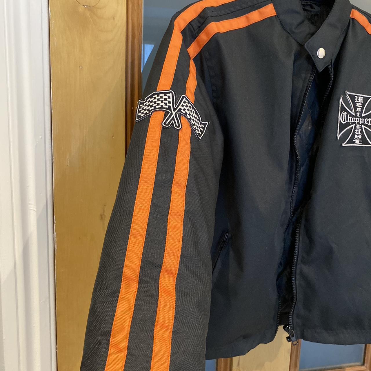 Black racer jacket with orange stripes. Embroidered... - Depop