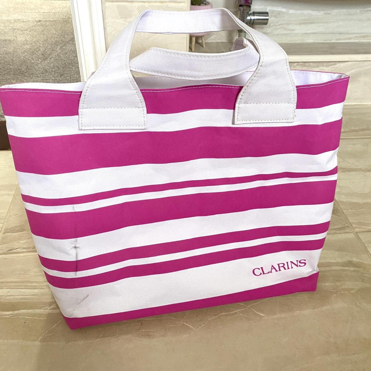 Clarins pink & white striped beach bag Used with... - Depop