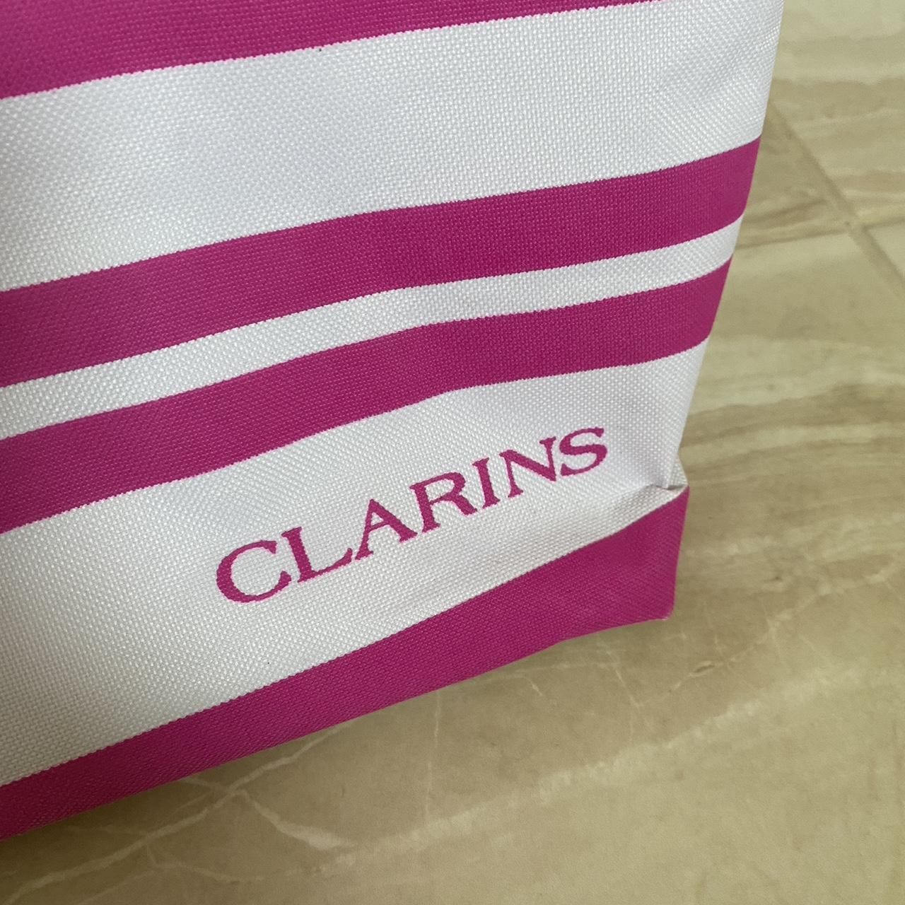 Clarins pink & white striped beach bag Used with... - Depop