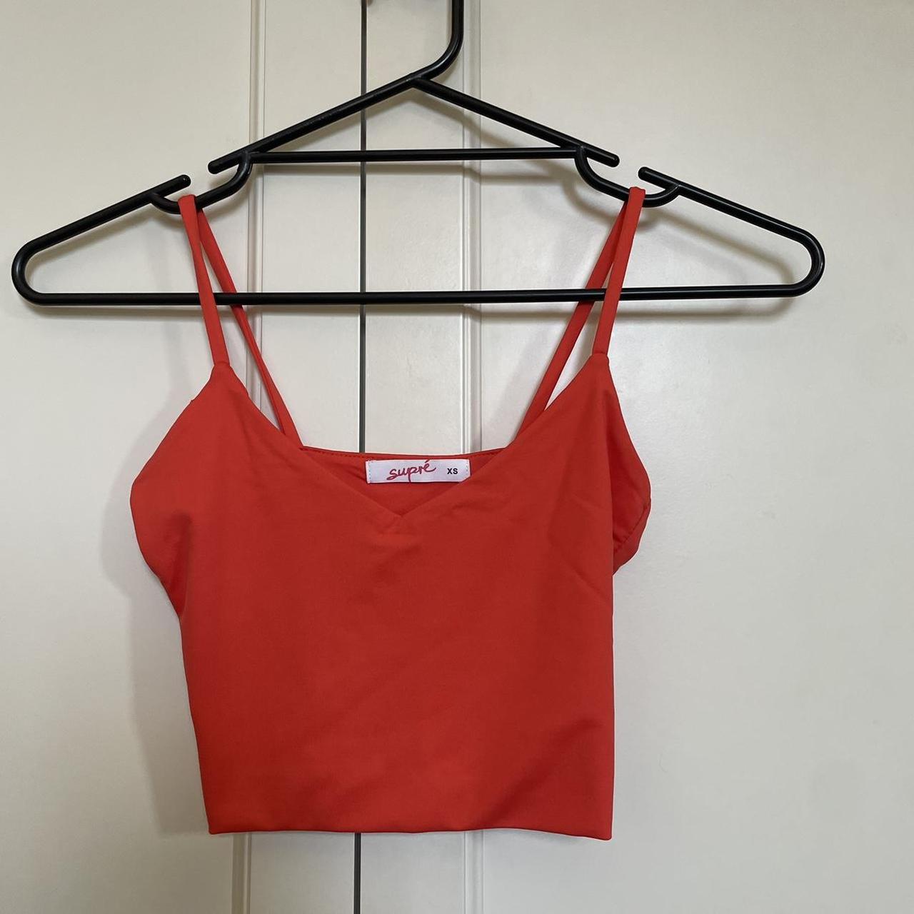 Supre orange/coral top, size XS, never... - Depop