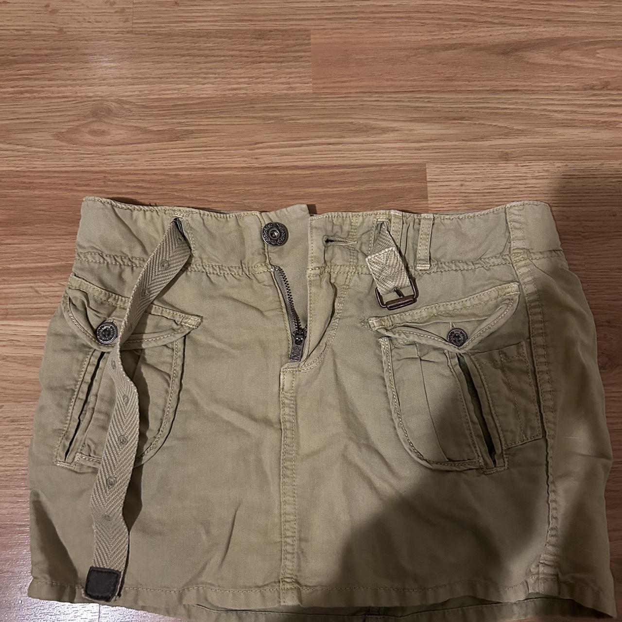 this is a cute beige kaki cargo mini skirt! with a... - Depop