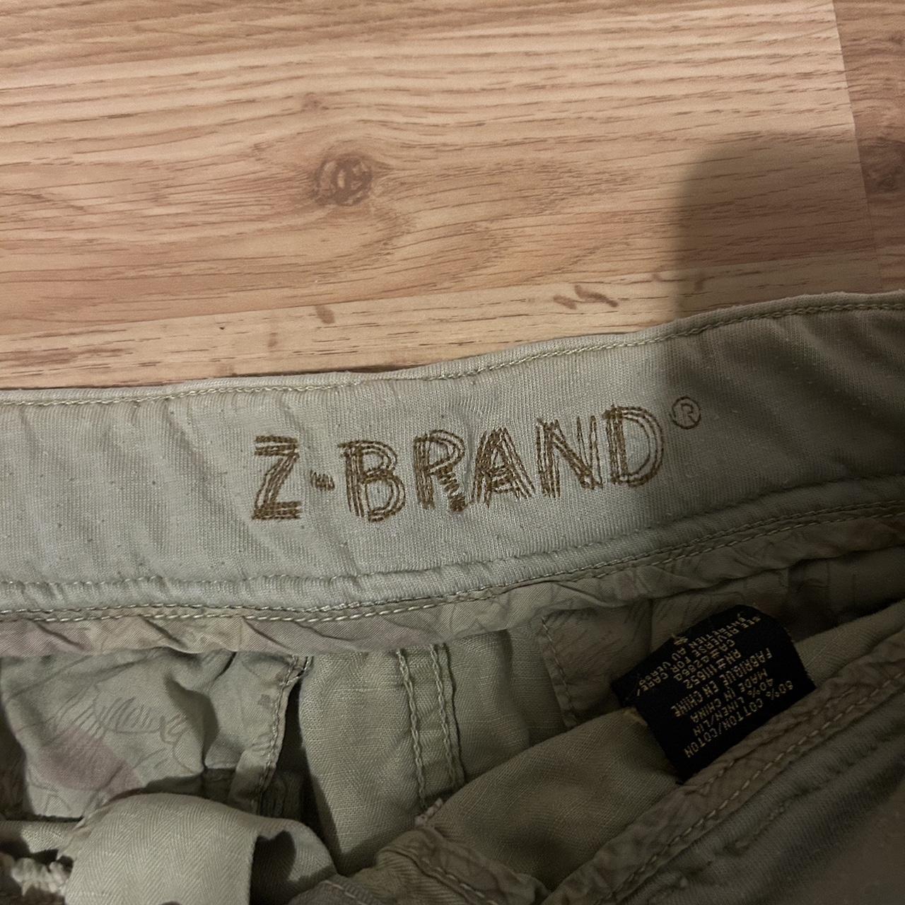 this is a cute beige kaki cargo mini skirt! with a... - Depop