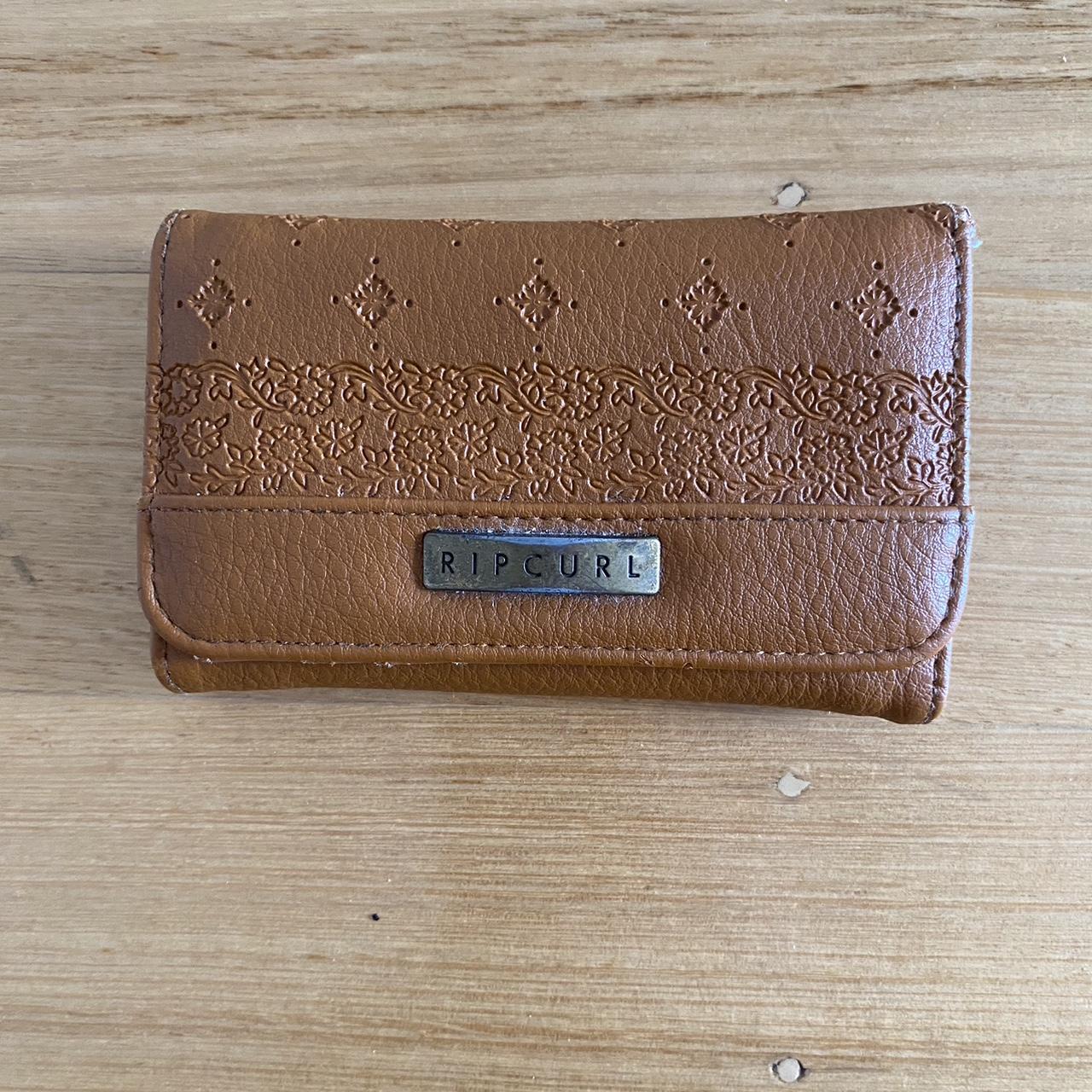 Rip Curl wallet, some pen markings and rips. - Depop