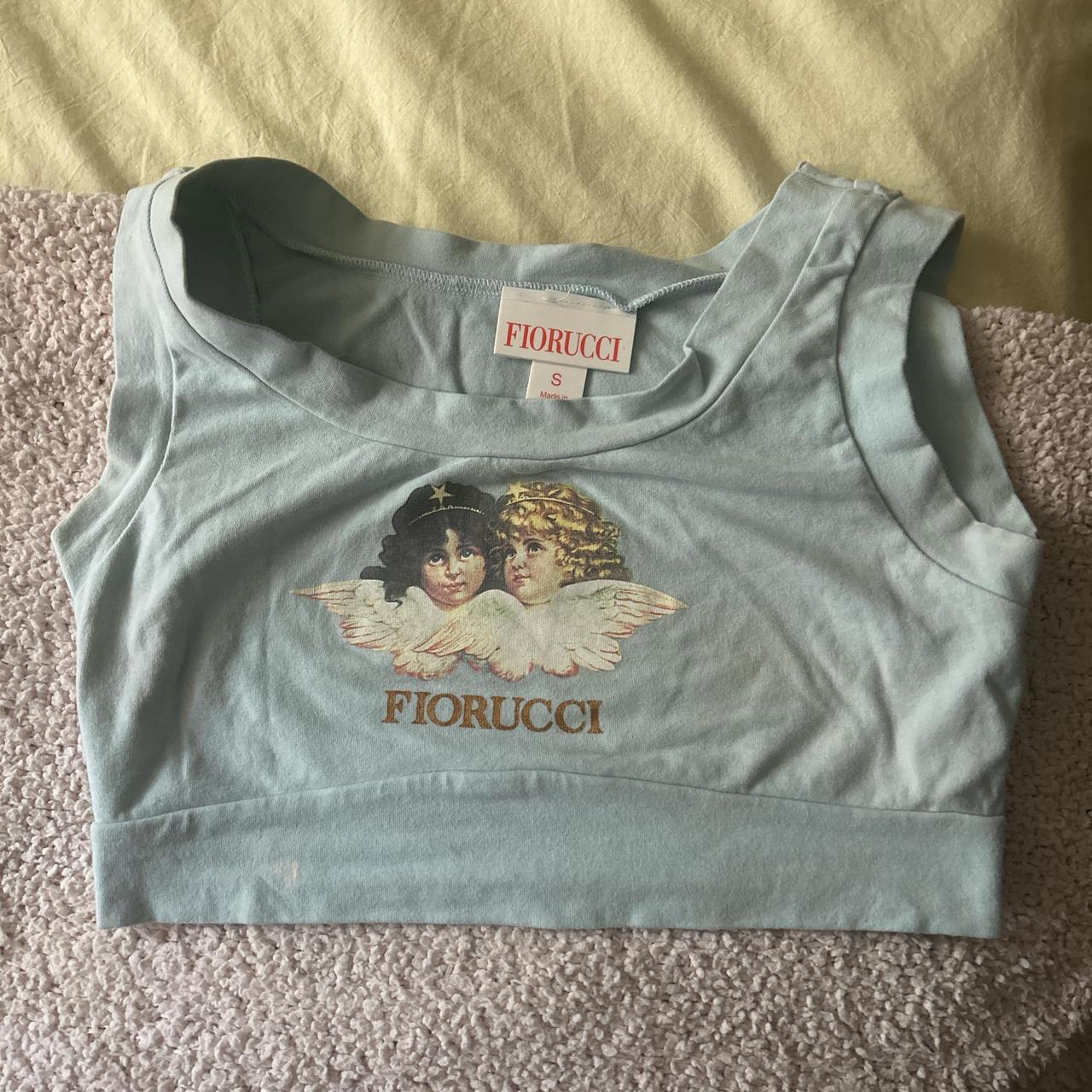 Fiorucci Light Blue Tank Angel Top (size tag is... - Depop