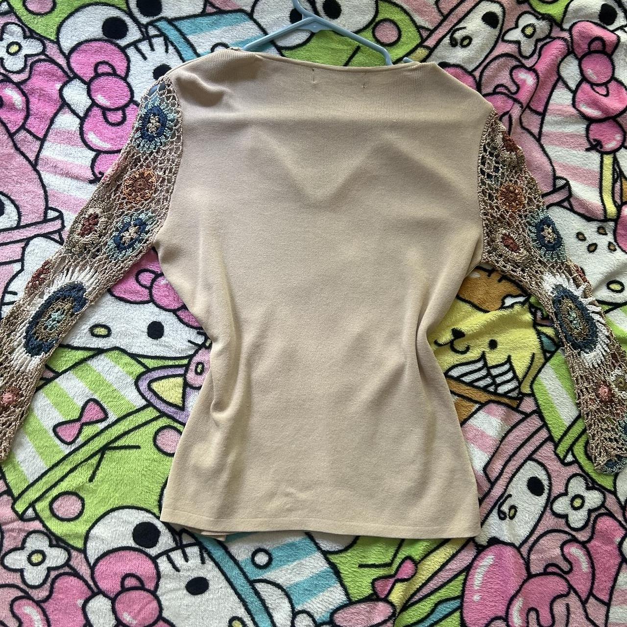 cute cream colored top with knit/crochet floral... - Depop