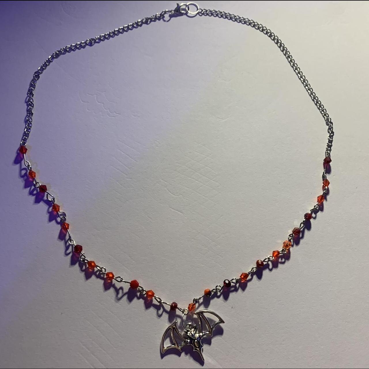 Handmade gothic bat necklace with red beaded chain... - Depop