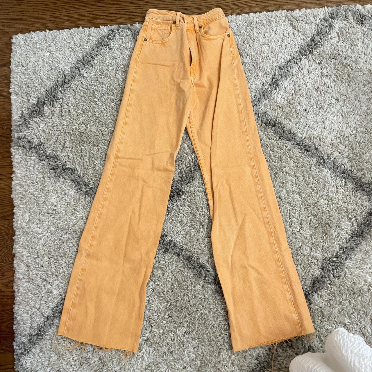 orange zara bootleg jeans - Depop
