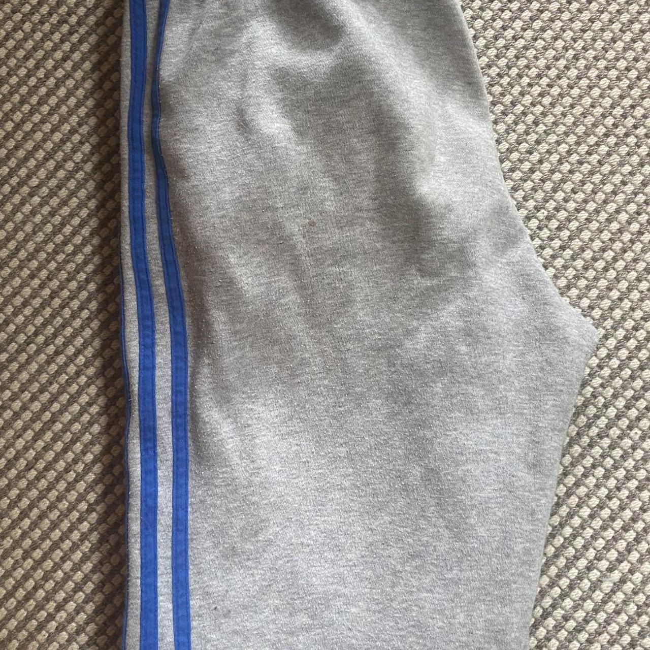 Adidas trackies with blue stripe down the side.... - Depop