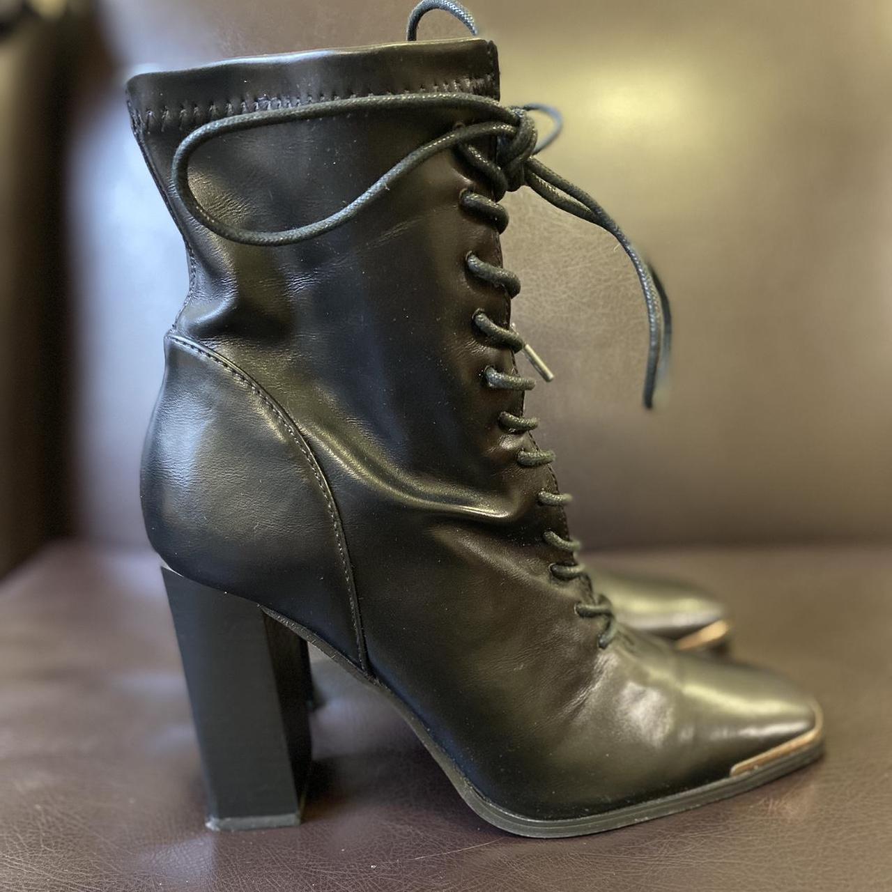 The coolest lace up black boot heels with gold rim... - Depop