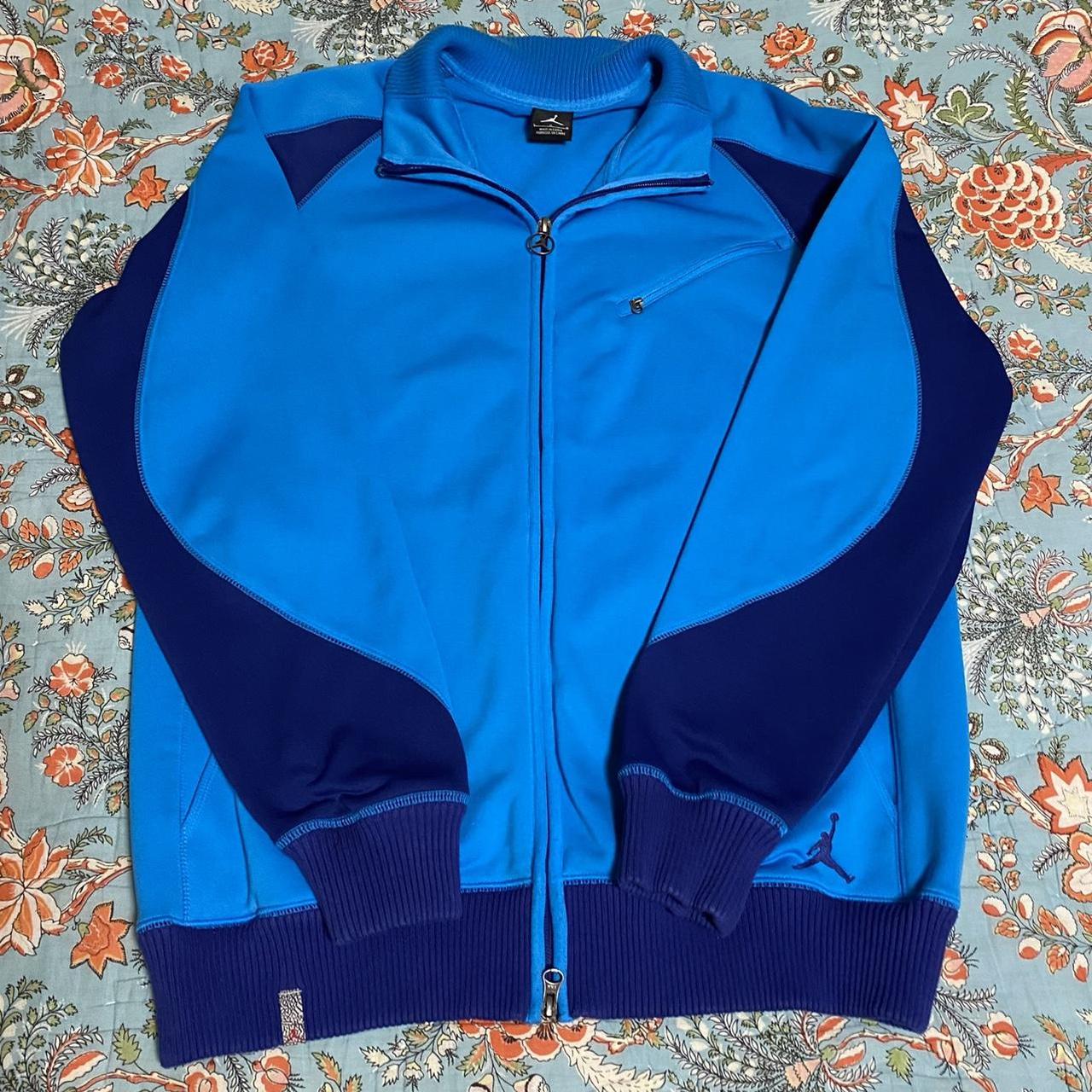 Jordan light blue and dark blue color blocked jacket... - Depop