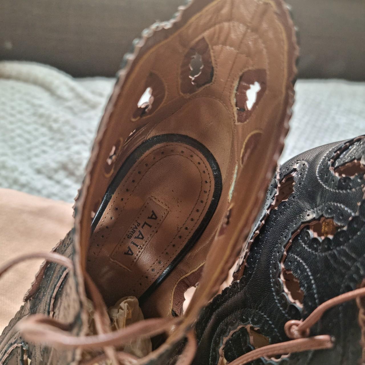 ALAÏA ankle heel boots, laser cut leather Very dark... - Depop