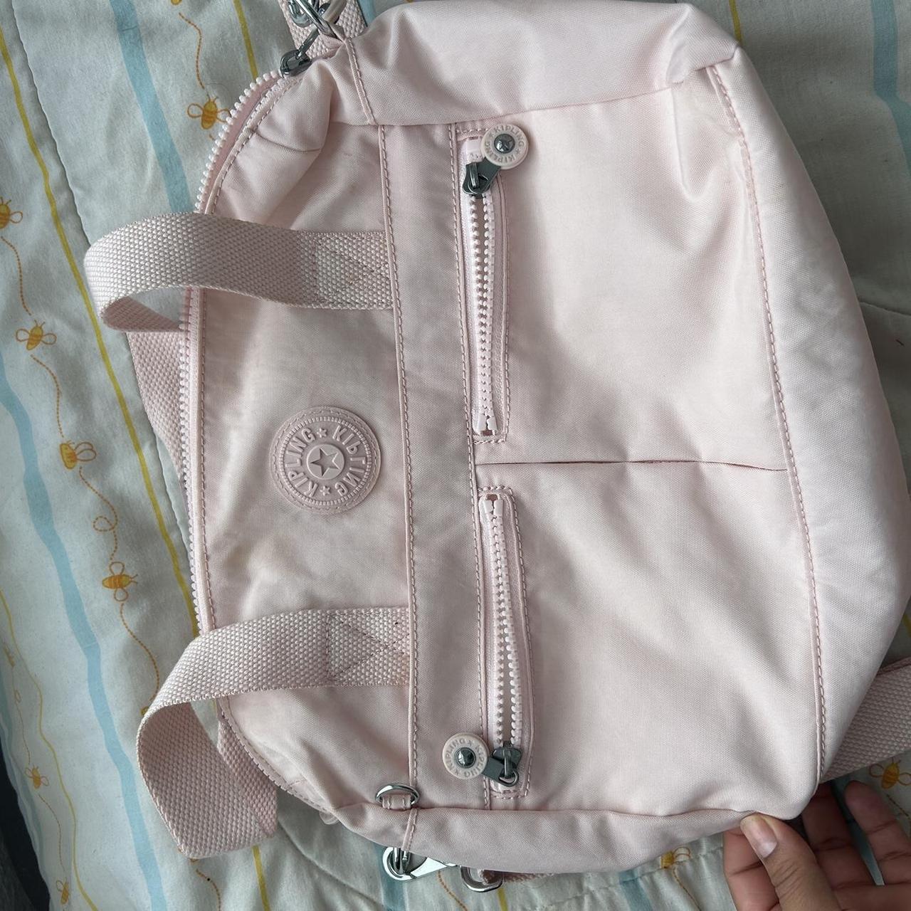 Baby pink Kipling side bag with lots of space and... - Depop