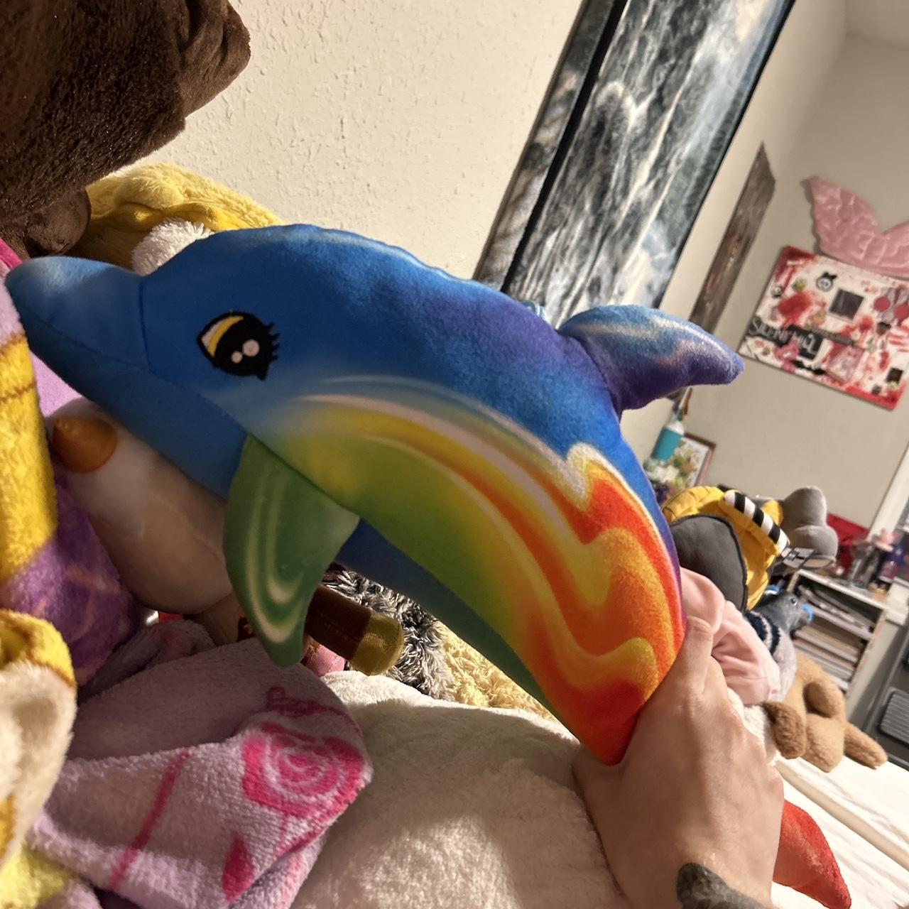 Lisa frank dolphin plushie 🌈 makes me think of tht... - Depop