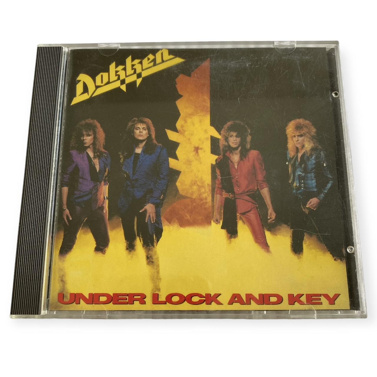 Dokken “Under Lock and Key” CD. Case has many light... - Depop