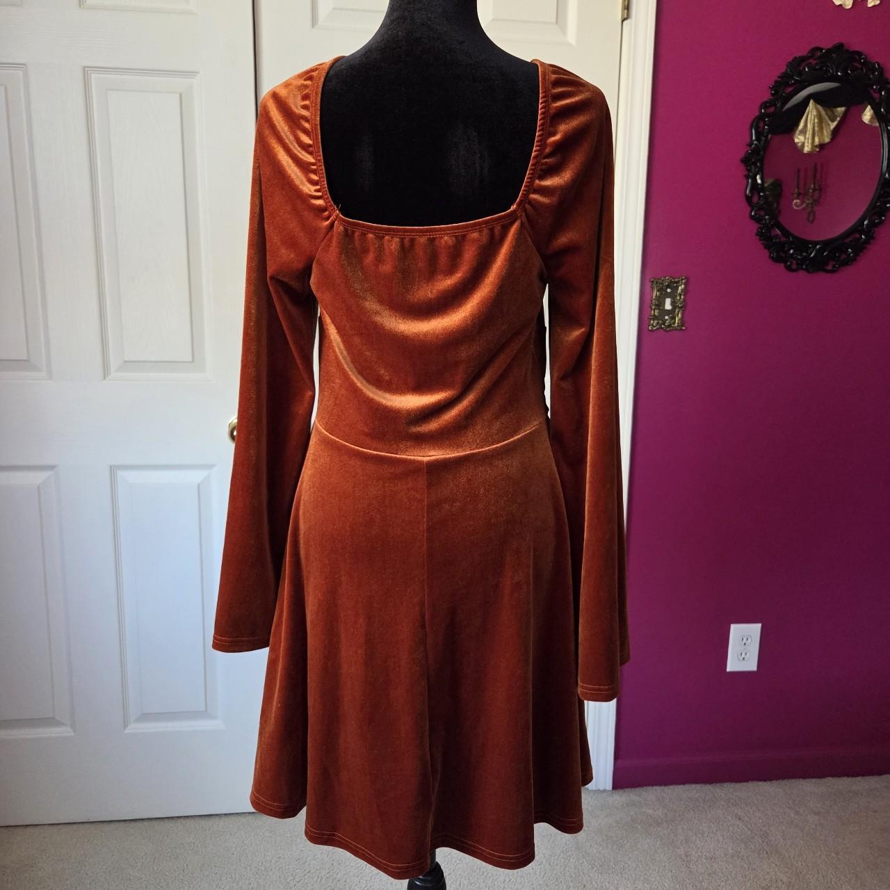 Orange velvet dress with square neckline and belled... | Depop