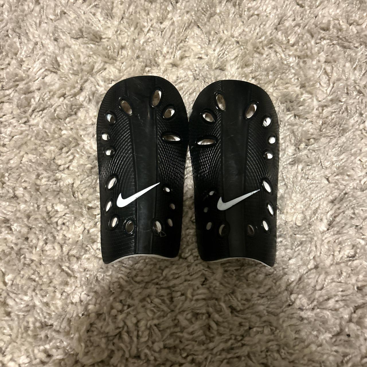 Nike black and white shin guards #football... | Depop