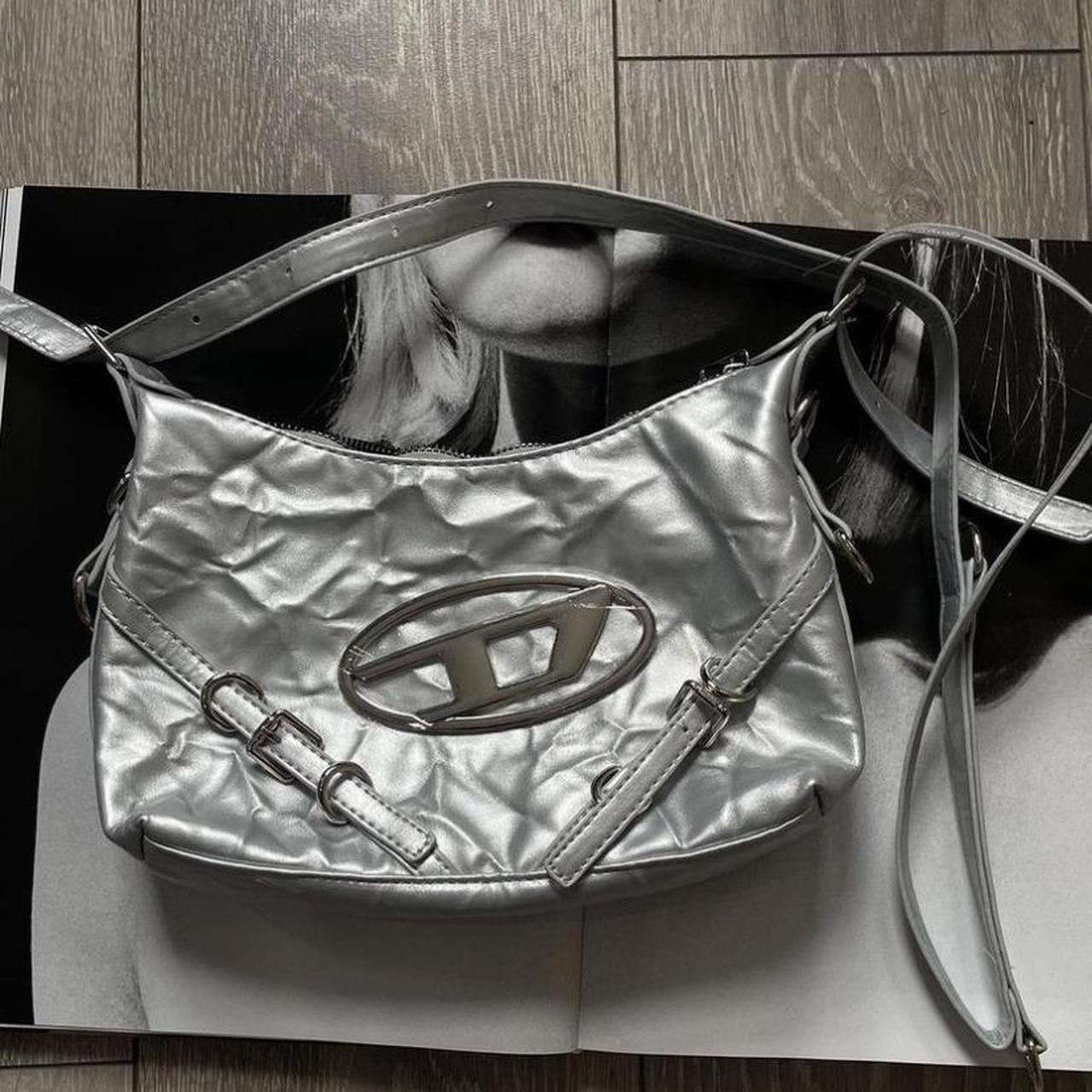 silver metallic ‘D’ logo crossbody bag, like new - Depop