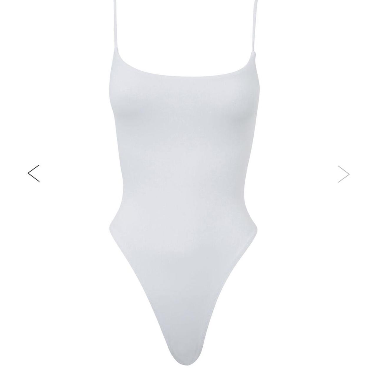 White supre strappy body suit never been worn size XS - Depop